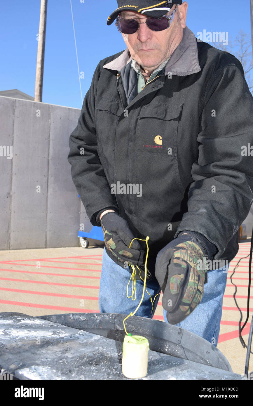 Crane Army Ammunition Activity workers burn aircraft flares to ensure ...