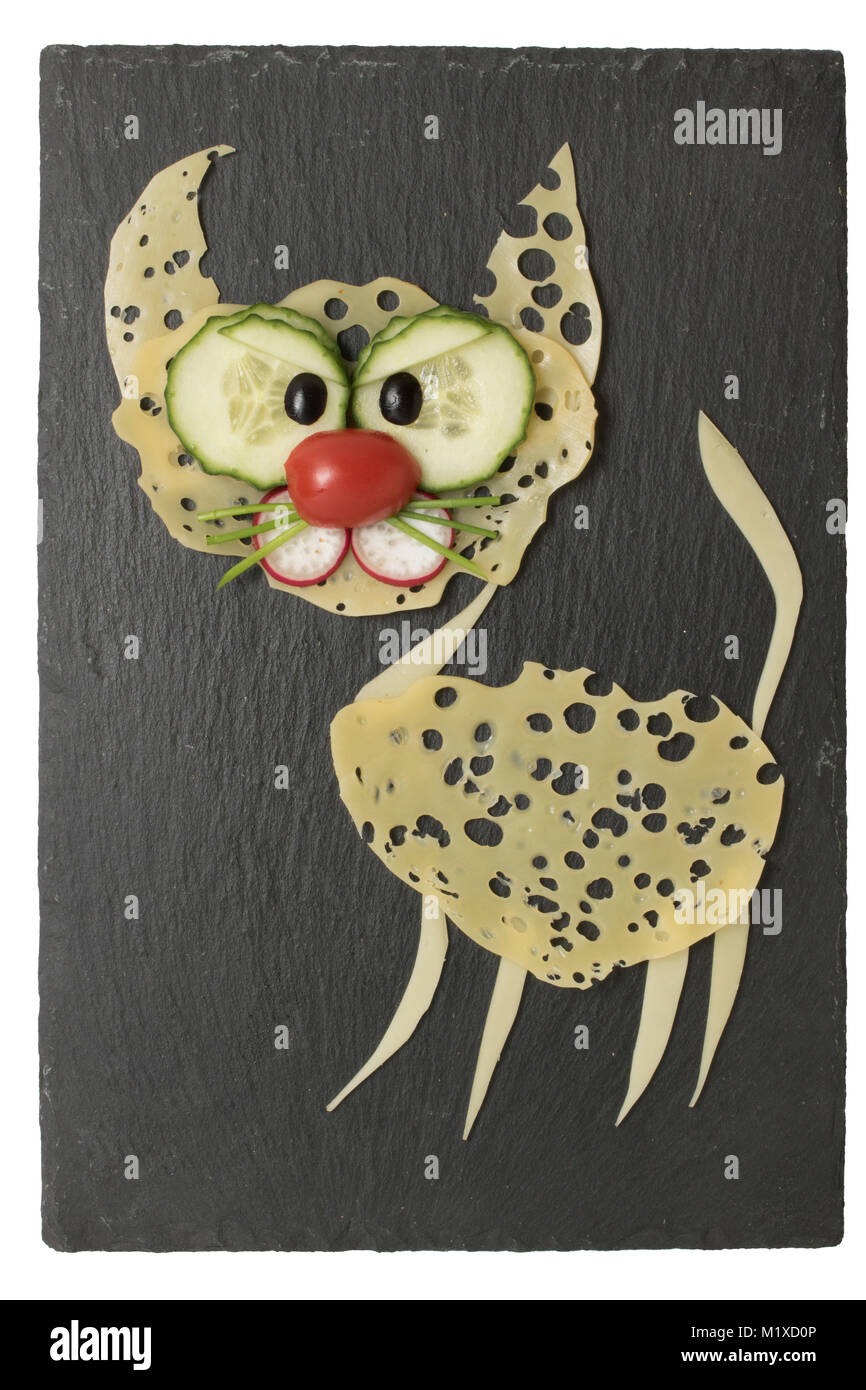 Angry cat made with cheese and vegetables on slate tray Stock Photo - Alamy