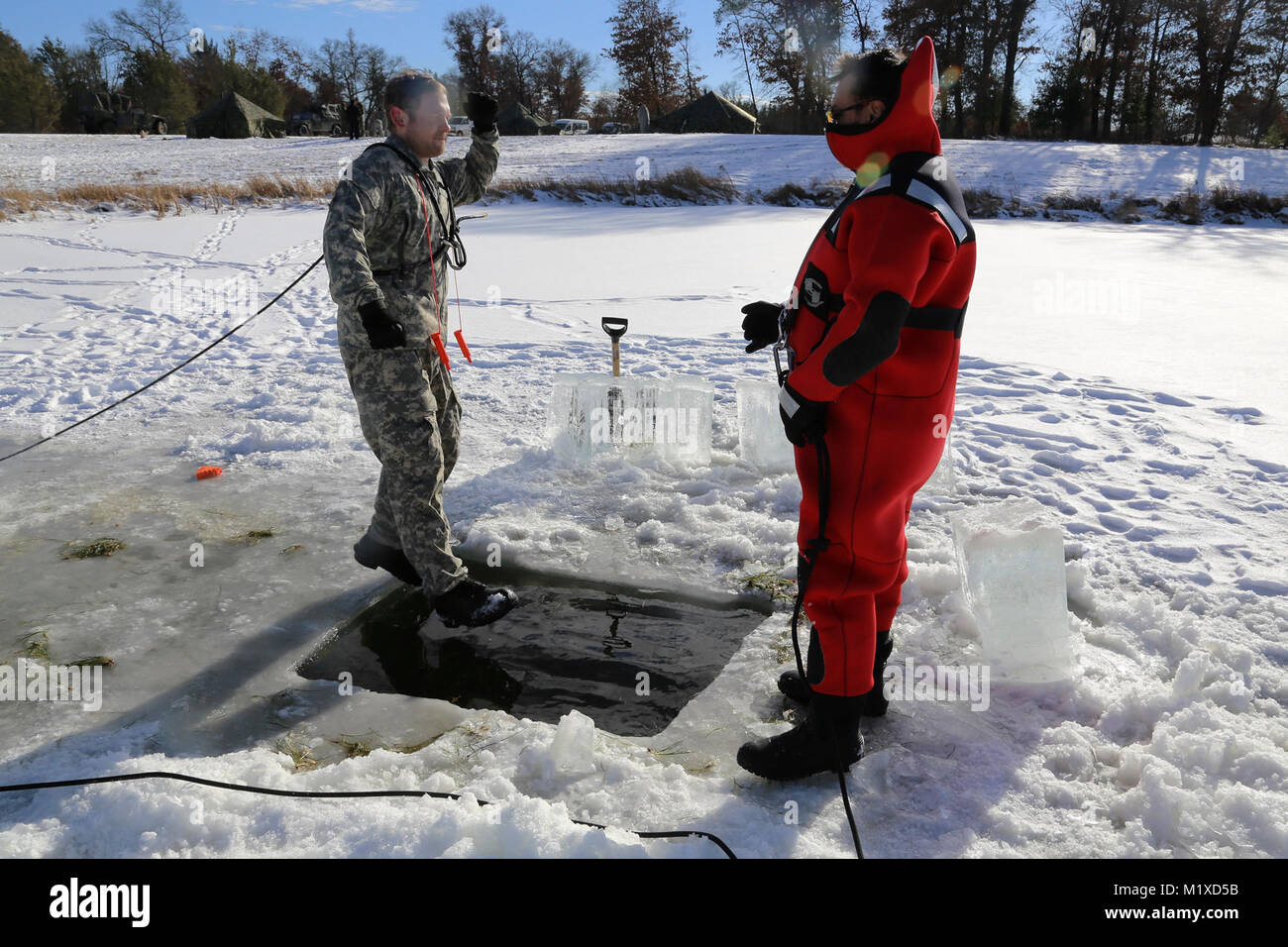 A Soldier participates in cold-water immersion training at an ice ...