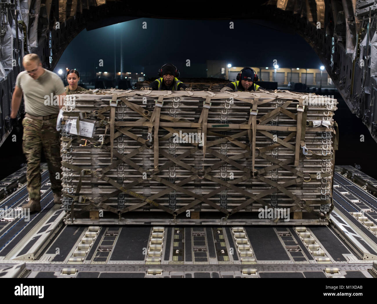 U.S. Air Force C-17 Globemaster III loadmasters assigned to the 816th ...