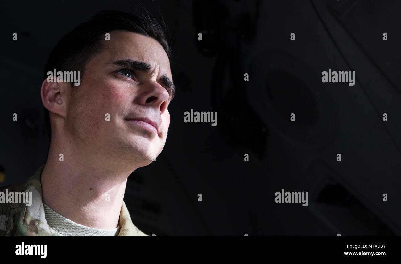 A U.S. Air Force C-17 Globemaster III flying crew chief, assigned to ...