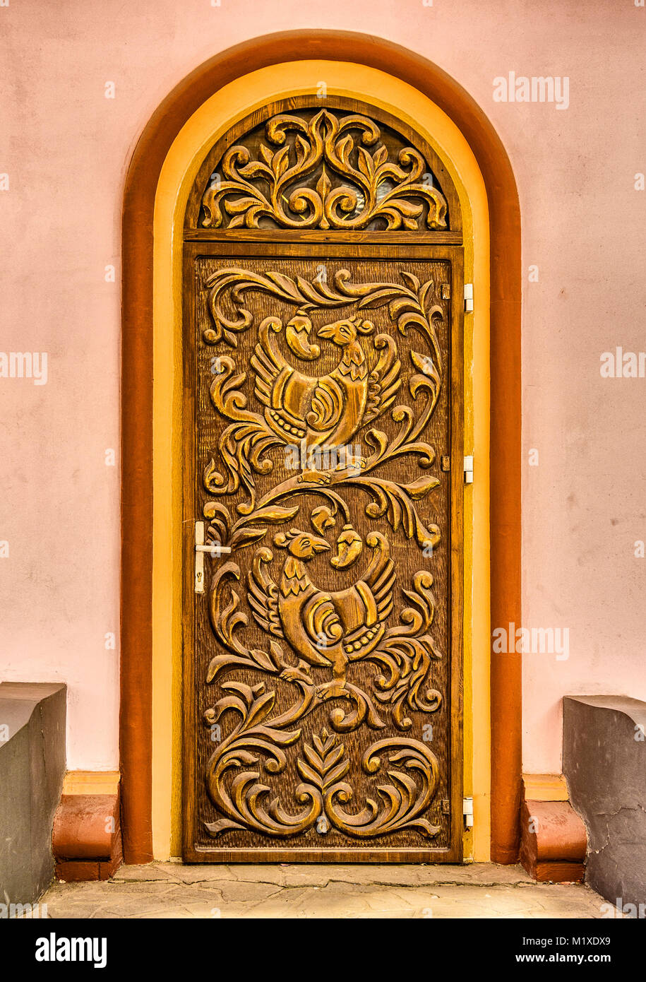 Beautiful carved wooden door in the style of a fairy tale Stock Photo ...
