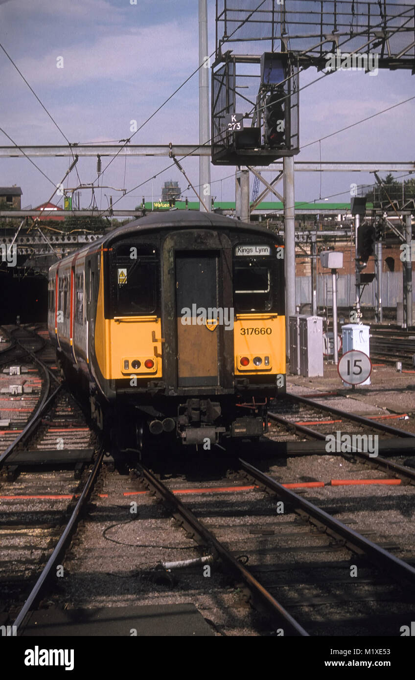 Class 317 passenger train approaching London Kings Cross station Stock ...