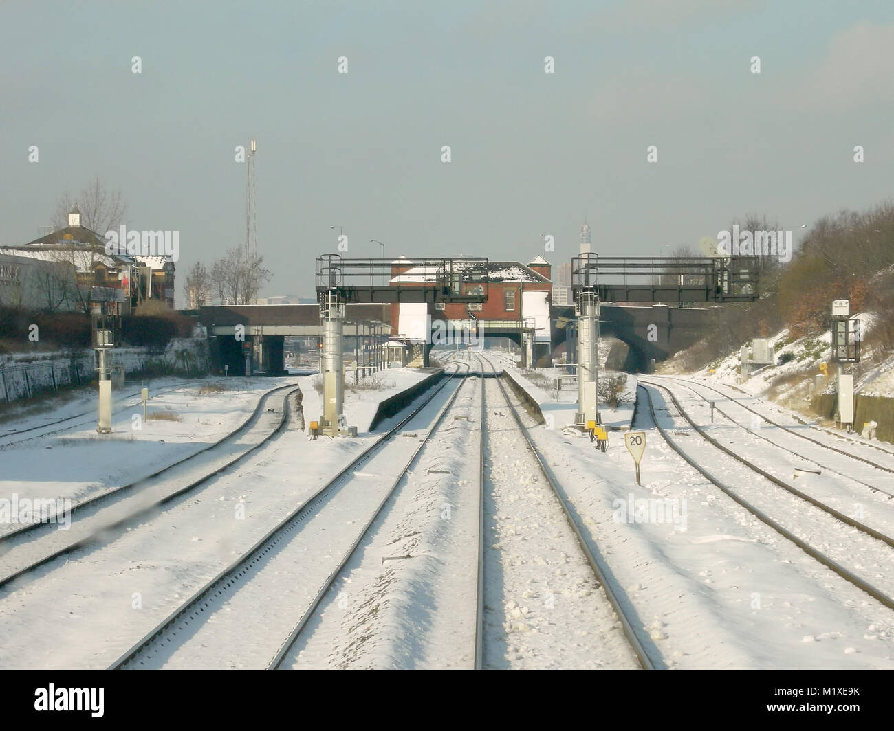 The railway line in the winter snow in the West Midlands of England ...