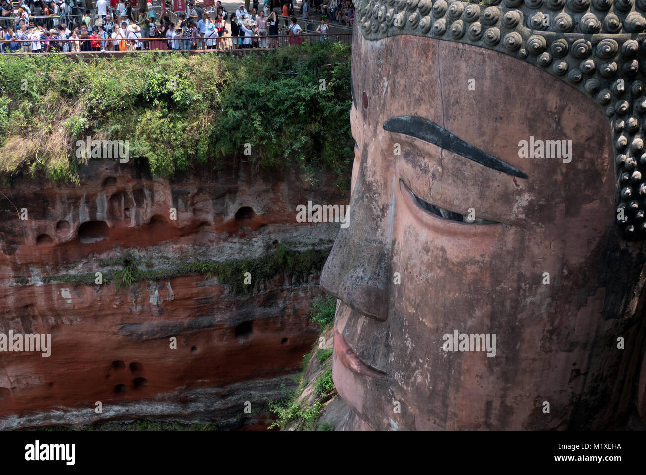 The Leshan Giant Buddha carved out of a cliff where the Min and Dadu ...