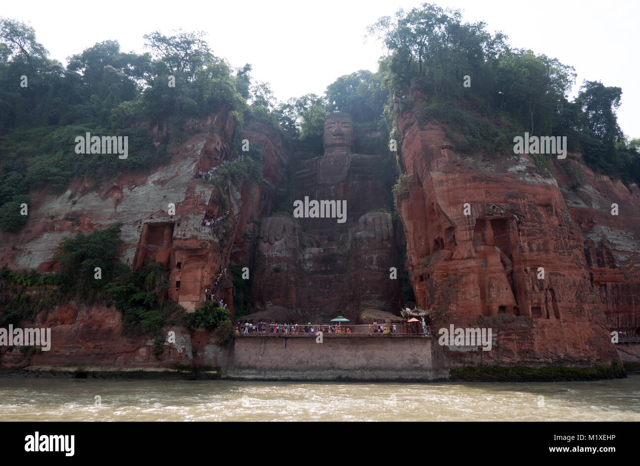 The Leshan Giant Buddha carved out of a cliff where the Min and Dadu ...
