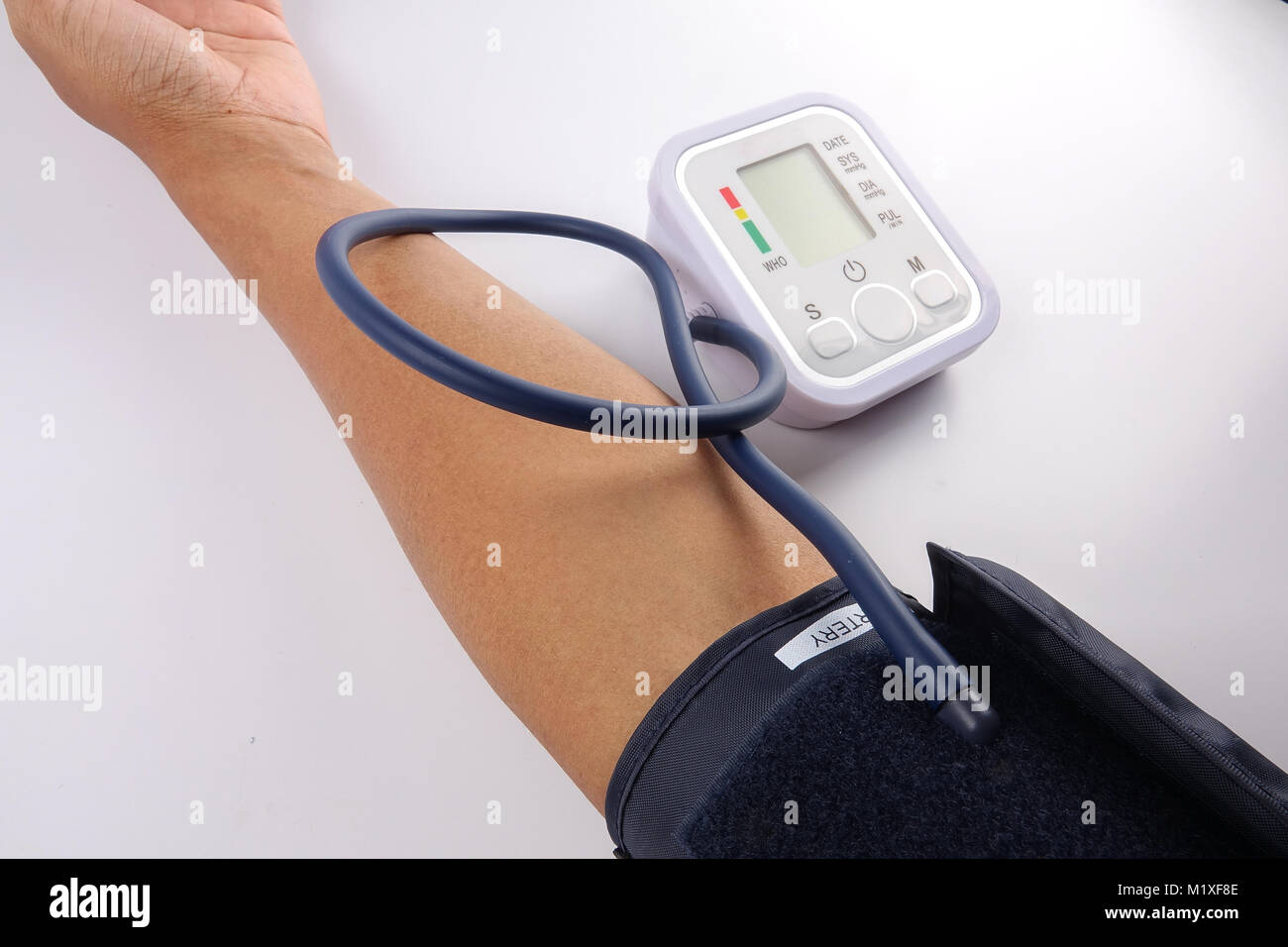 Male hand with blood pressure meter Stock Photo - Alamy