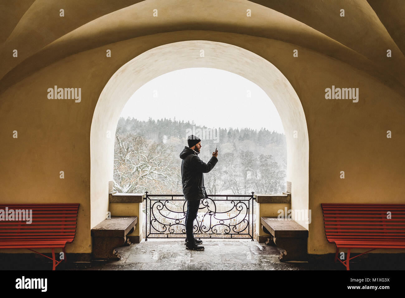 Man on balcony hi-res stock photography and images - Alamy