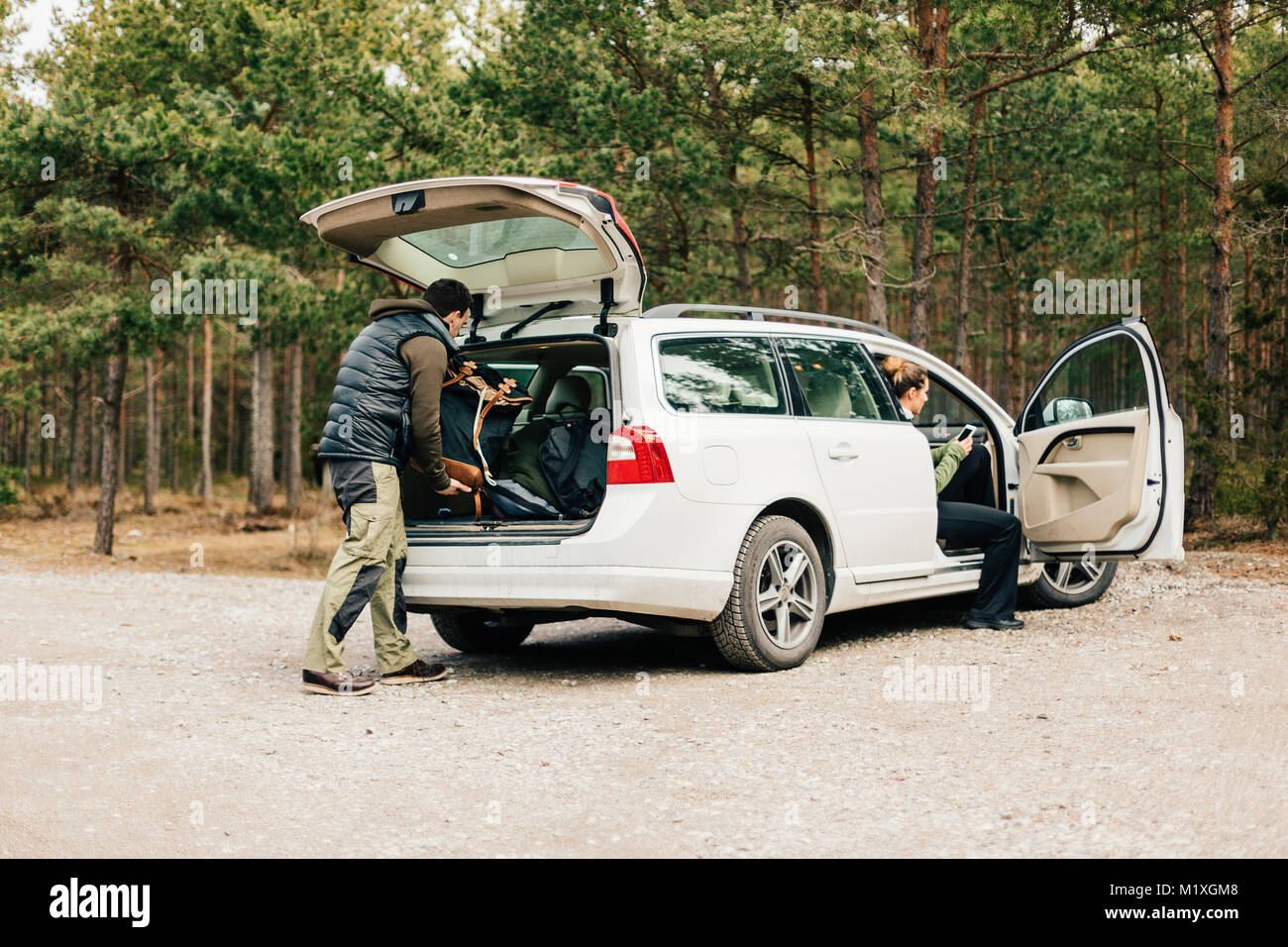 Loading in car boot hi-res stock photography and images - Alamy