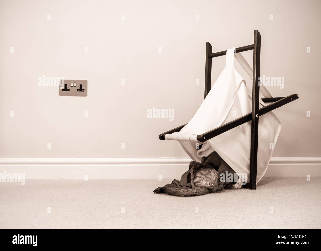 A little of domestic disturbance - washing falling out of an upside ...