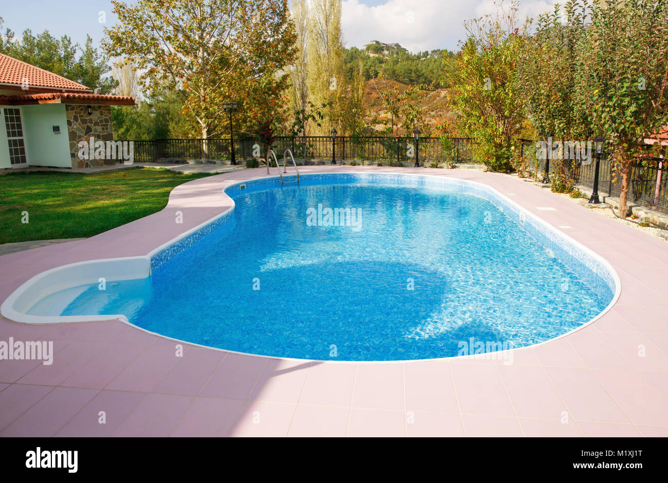 Swimming pool at holiday villa in Cyprus Stock Photo - Alamy