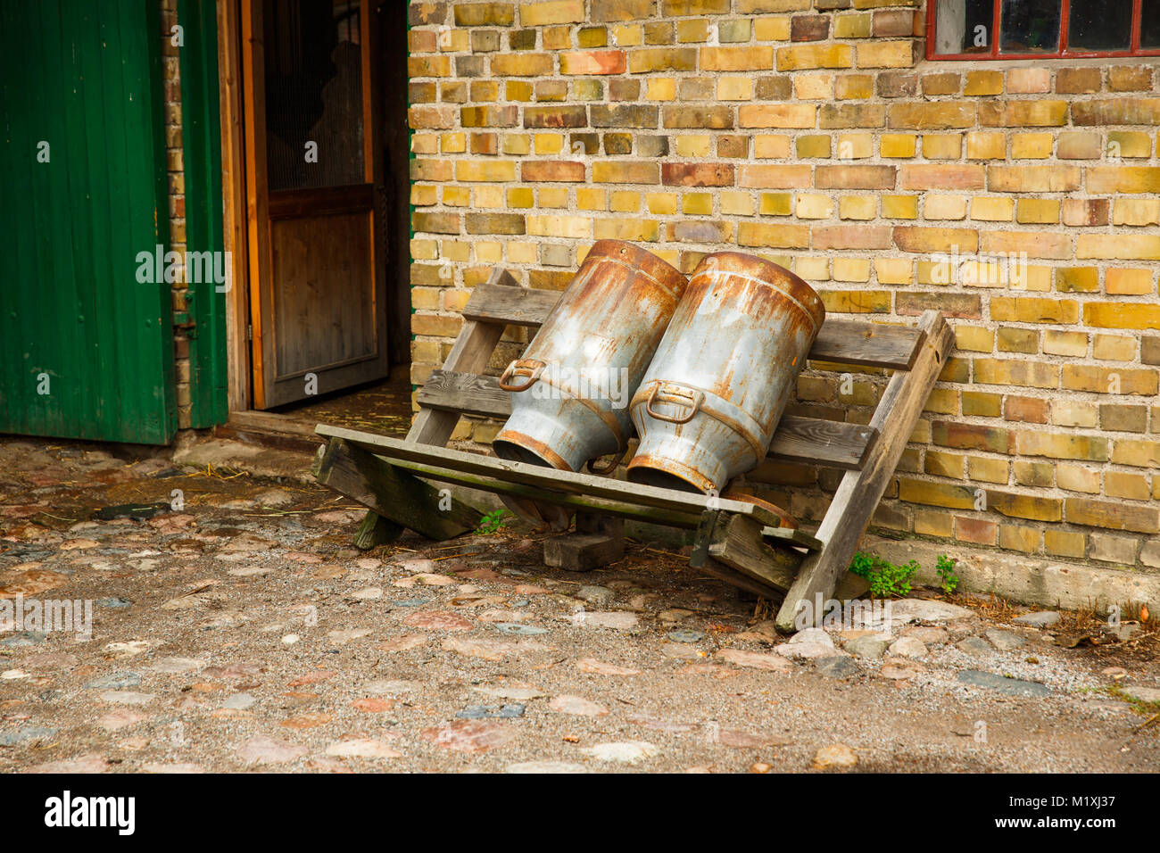 Traditional old farm at Skansen park, the first open-air museum and zoo ...