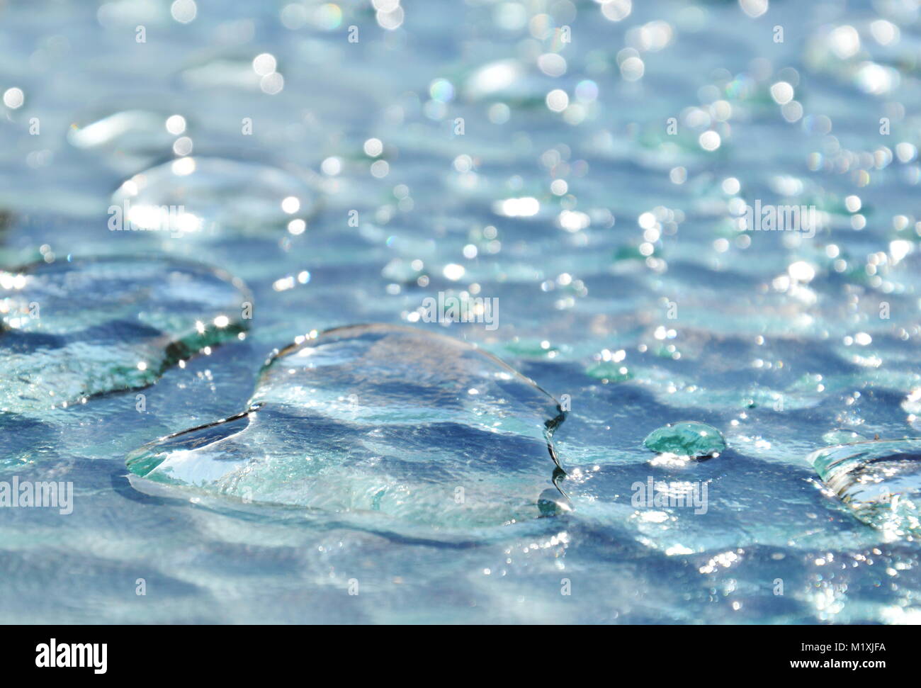 water drop roll on table Stock Photo - Alamy