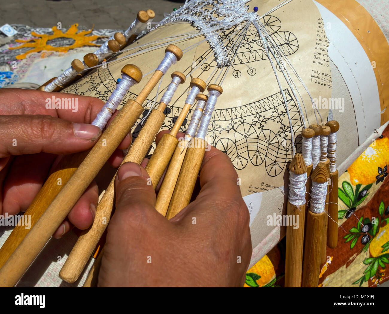 Technique hand-woven lace on the bobbins Stock Photo - Alamy