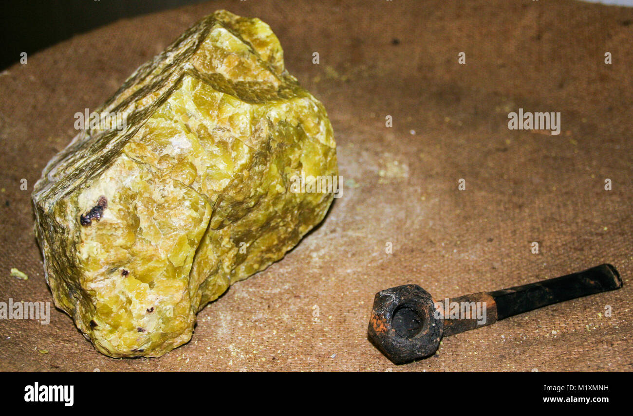 Sulfur rock on a barrel of wine Stock Photo - Alamy