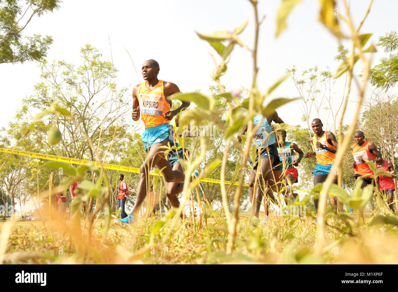 Ugandan athletes in action during a national cross country race at ...