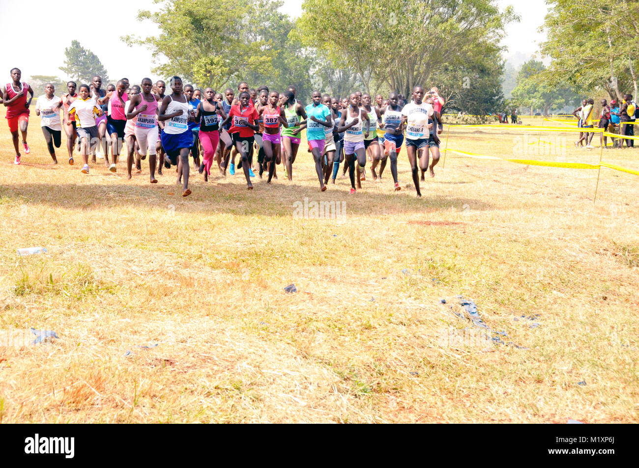 Ugandan athletes in action during a national cross country race at ...
