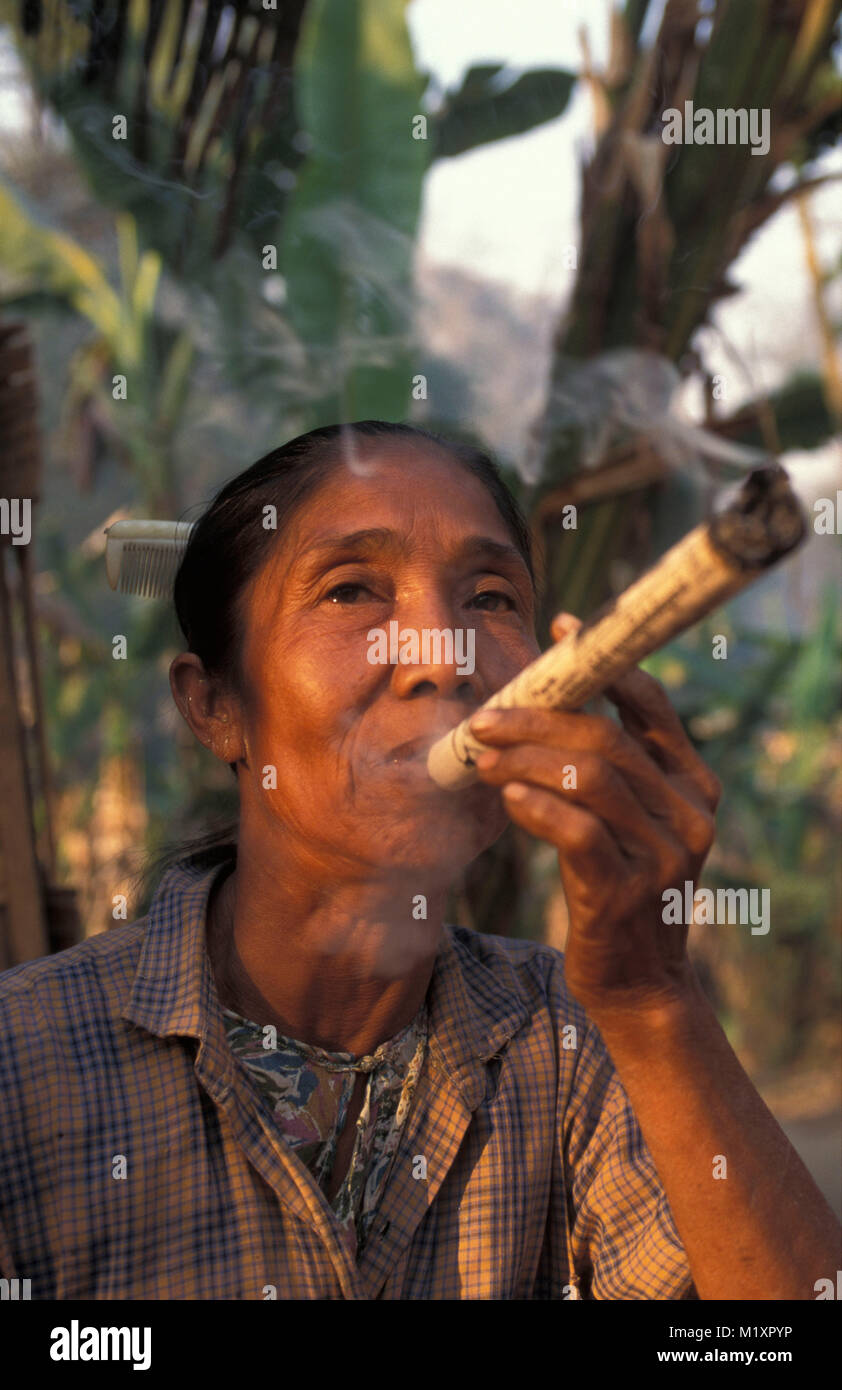 Myanmar (Burma). Bagan (Pagan). Portrait of Burmese Woman smoking ...