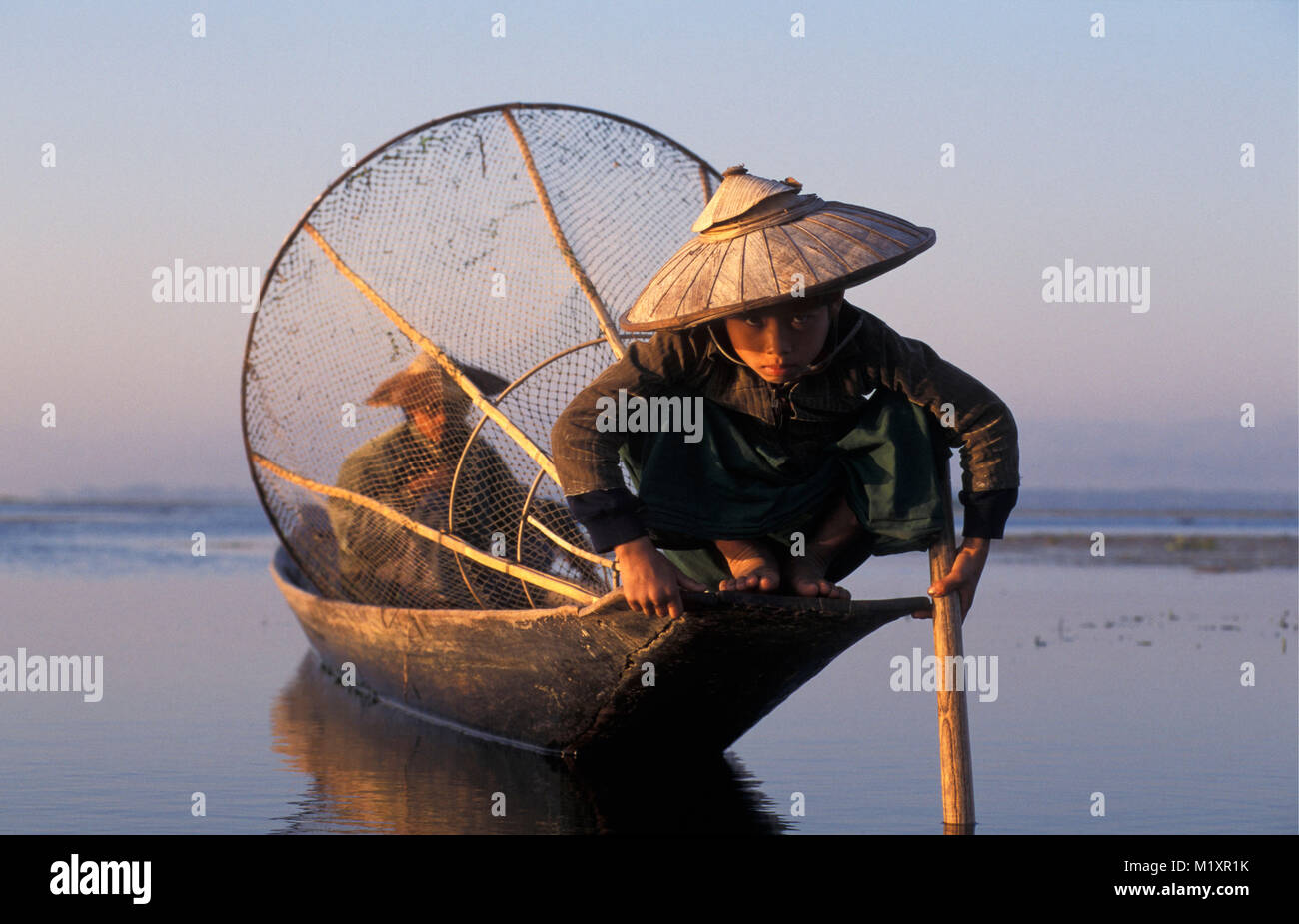 Myanmar (Burma). Inle Lake. Fishermen of Intha-tribe fishing in ...