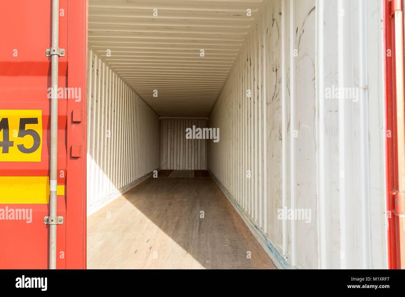 Interior of empty container use for shipping Stock Photo - Alamy