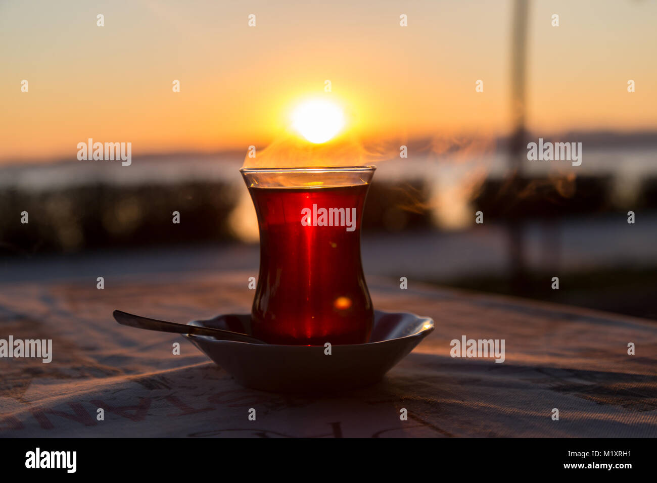 Turkish tea with reverse light image during the sunset for design Stock ...