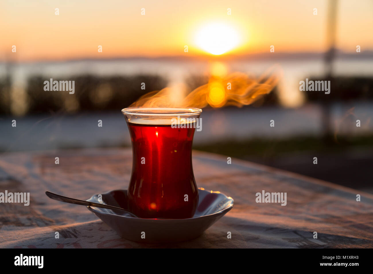 Turkish tea with reverse light image during the sunset for design Stock ...