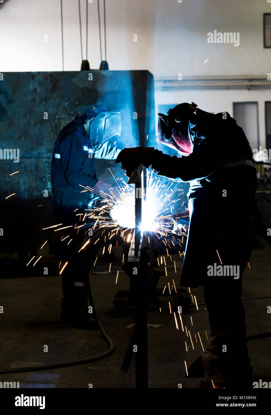 welding in the factory over manufacturing Stock Photo - Alamy