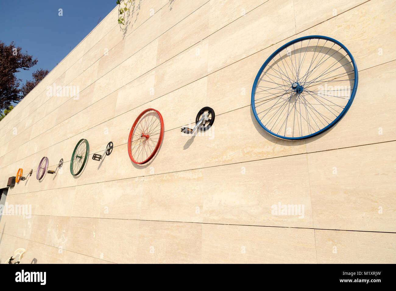 Wheel rim parts of bicycle on the wall Stock Photo - Alamy