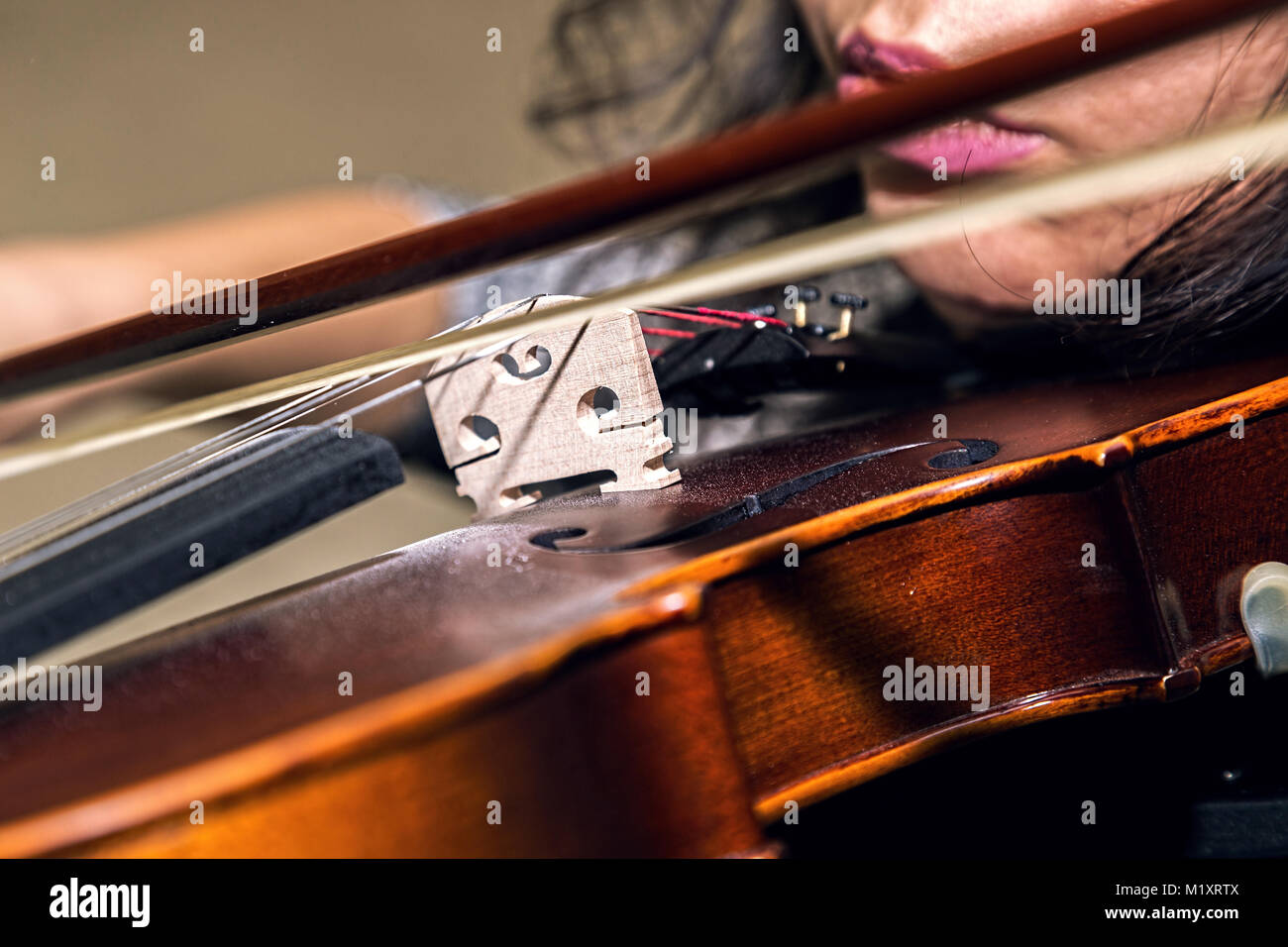 Women playing dusty violin, no effect added image Stock Photo - Alamy
