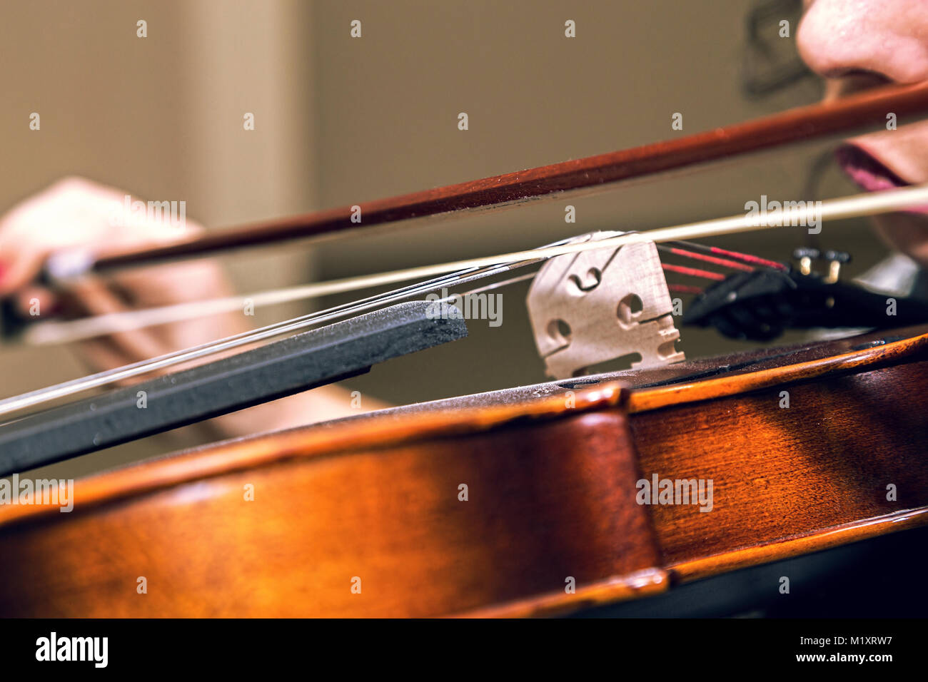 Women playing dusty violin, no effect added image Stock Photo - Alamy