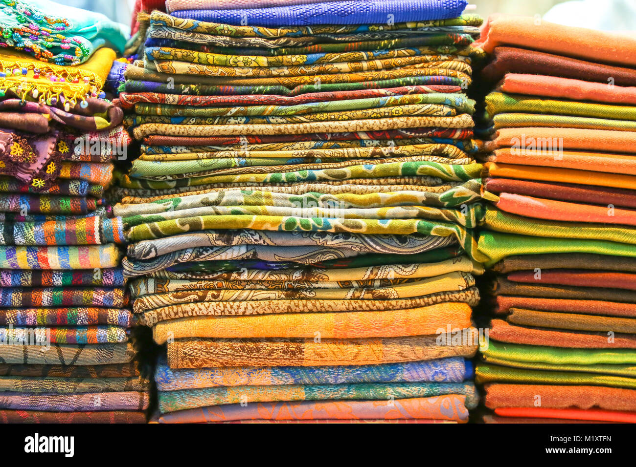 Stacked colorful Turbans for headwear Stock Photo - Alamy