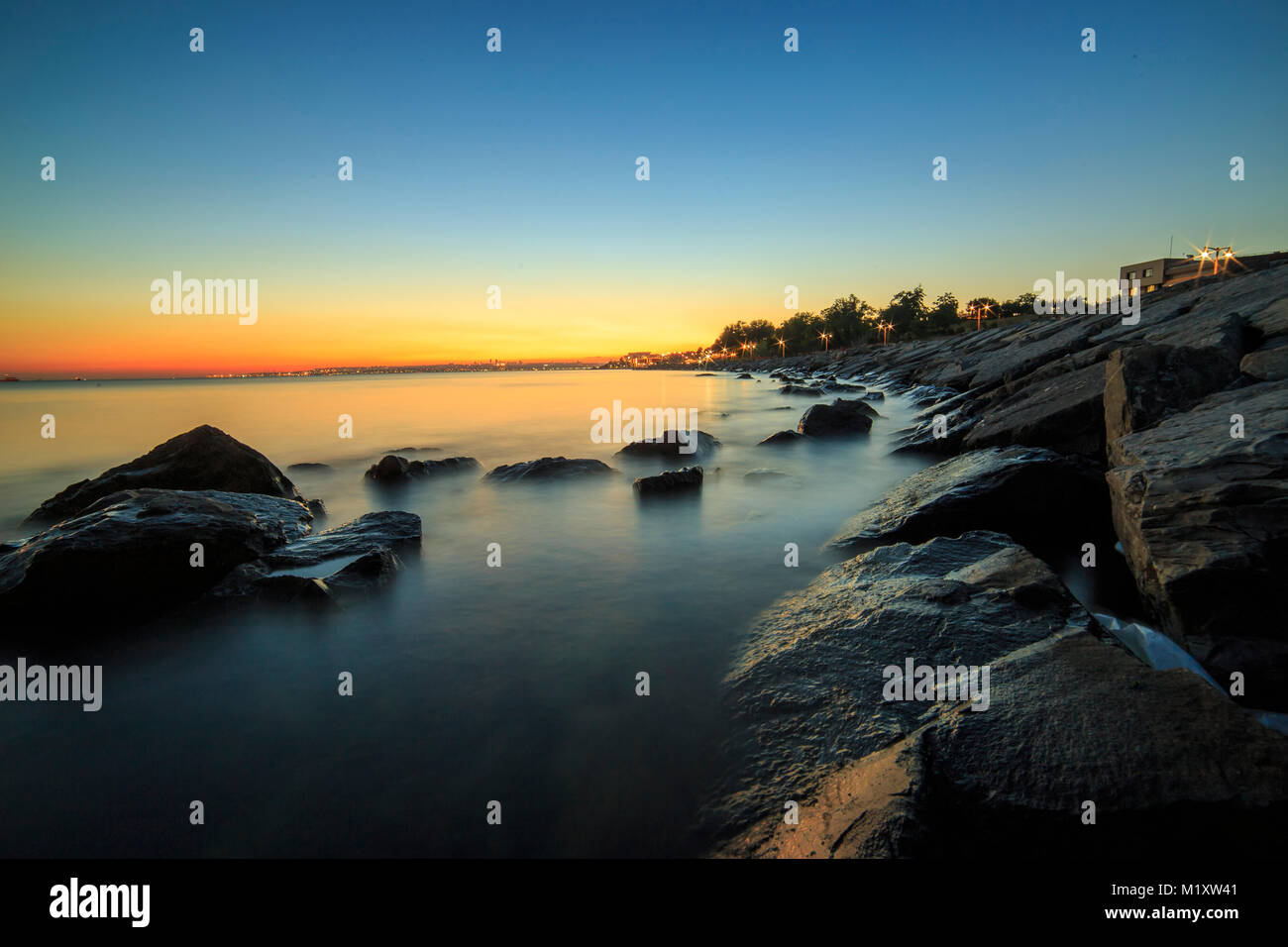 Empty sea and rocks During the sunset with Silky Sea beacuse of the ...