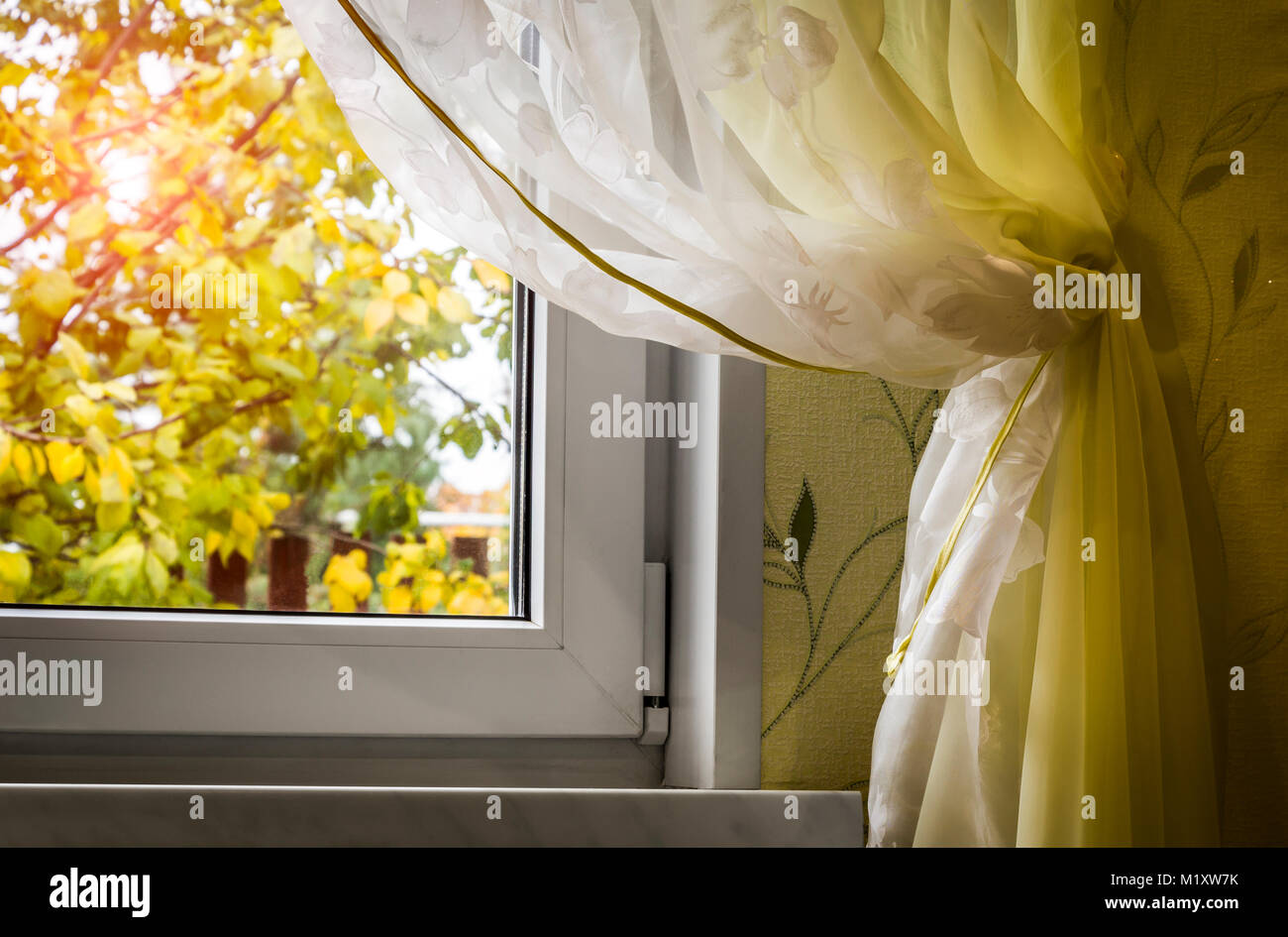 Autumn view from the window of a private house Stock Photo - Alamy