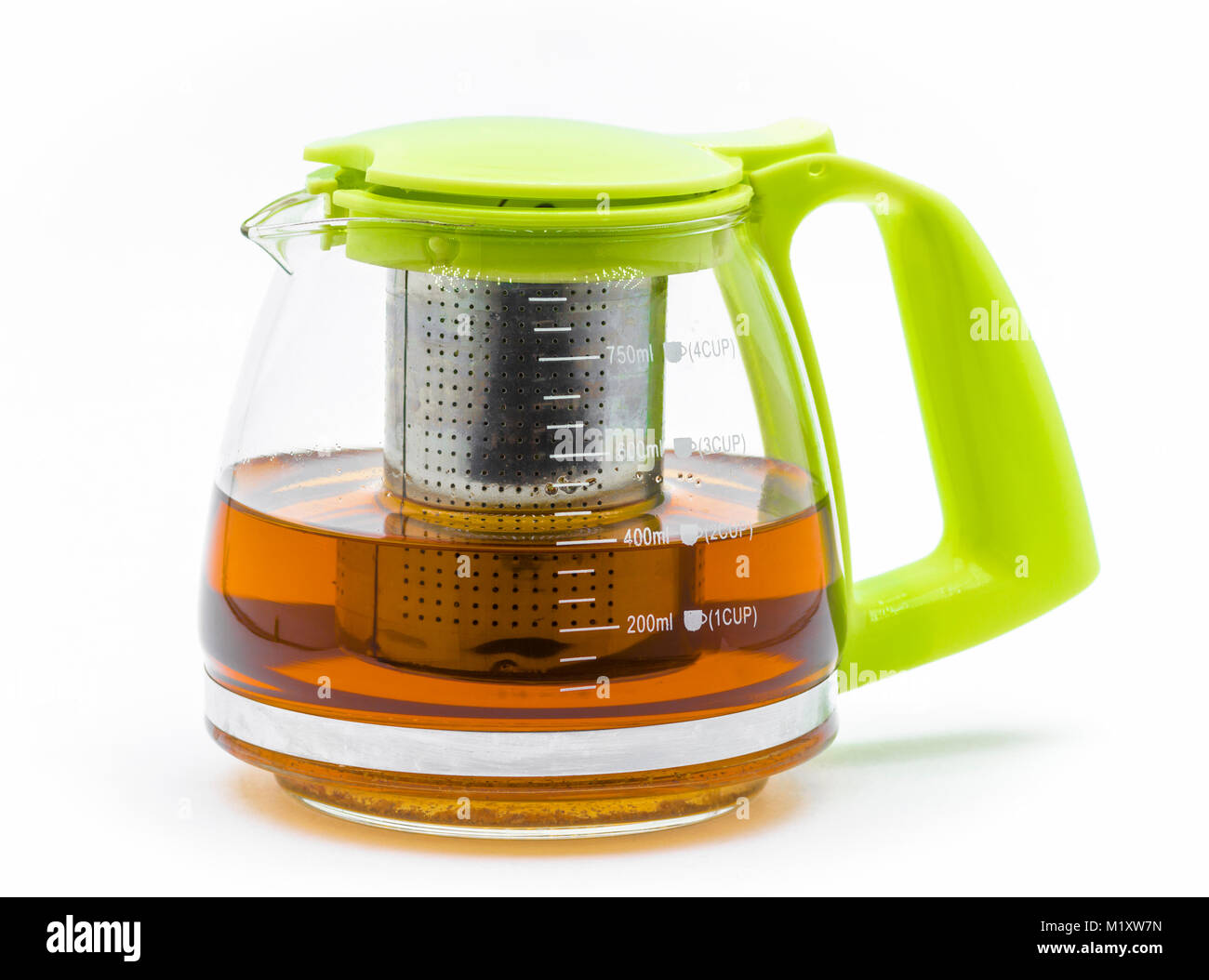 Modern teapot made of glass with a grid inside Stock Photo - Alamy