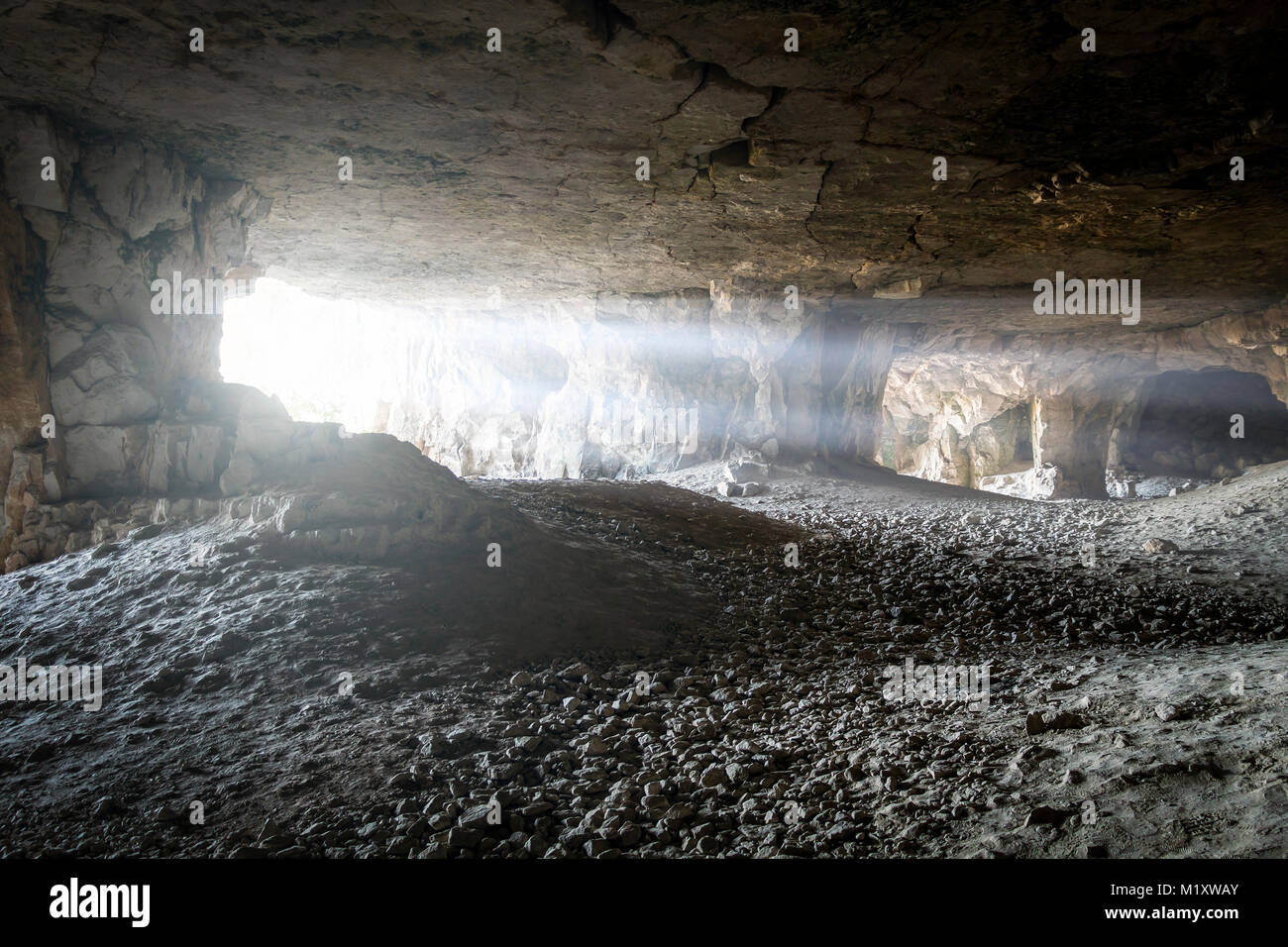 Inside an old abandoned mining limestone cave Stock Photo - Alamy
