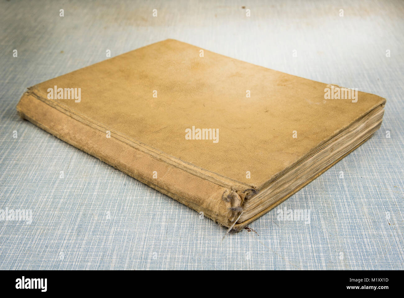 Old worn out vintage books on the table Stock Photo - Alamy