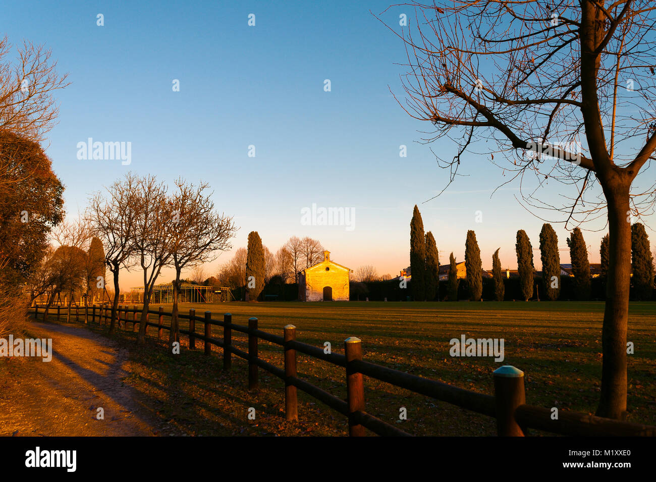 ancient small italian church in outdoor field in italy countryside ...