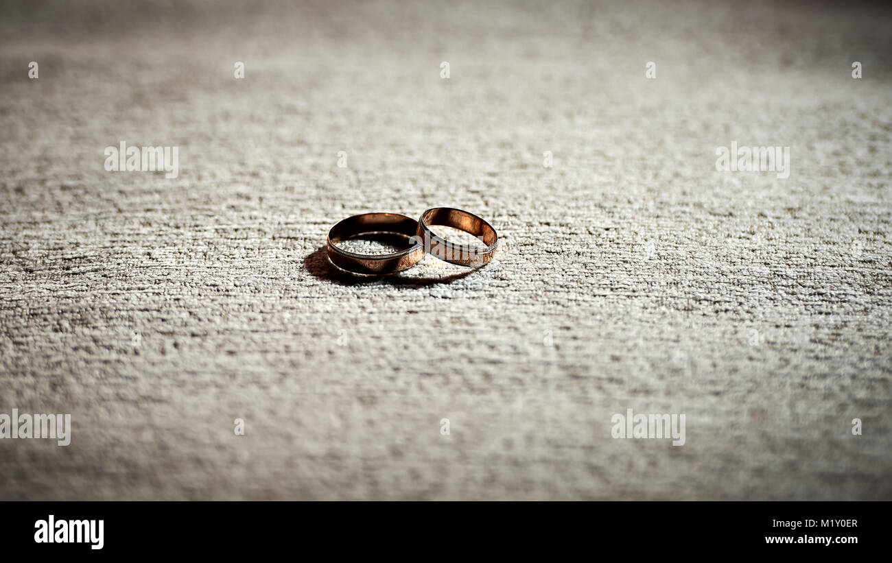 Close up two wedding rings Stock Photo - Alamy