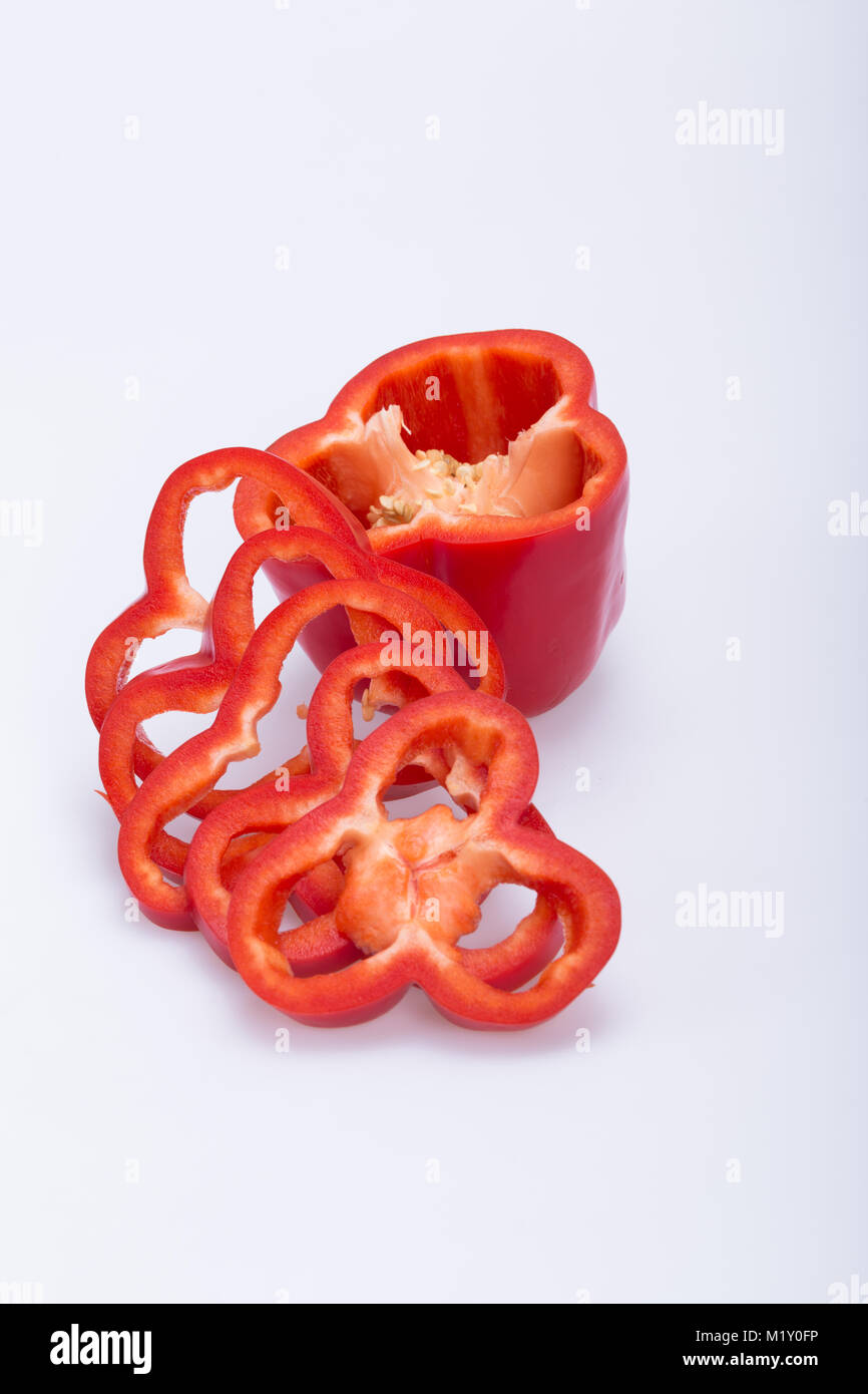 Sliced red pepper isolated on white background Stock Photo - Alamy