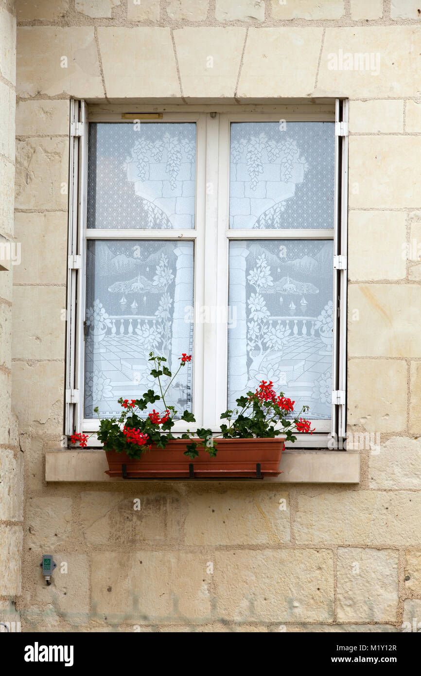 White window with flower pot Stock Photo - Alamy