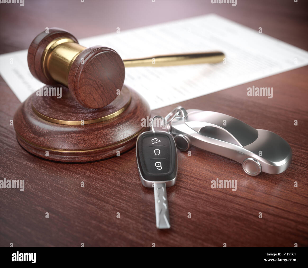 Auction hammer with golden details, a car key next to it and a contract ...