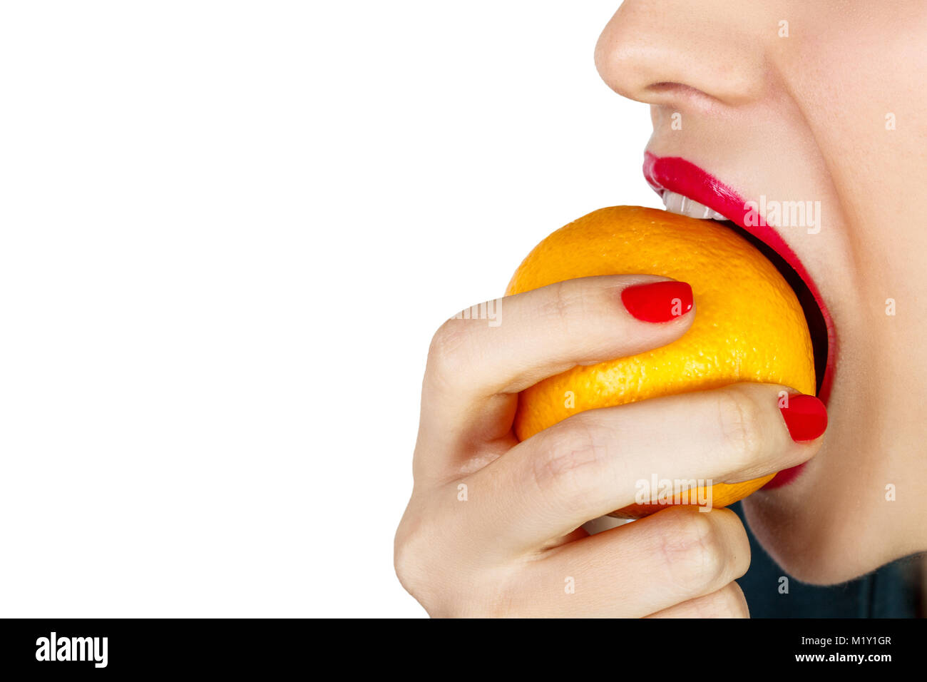 girl biting a lemon, close up isolated on white Stock Photo - Alamy