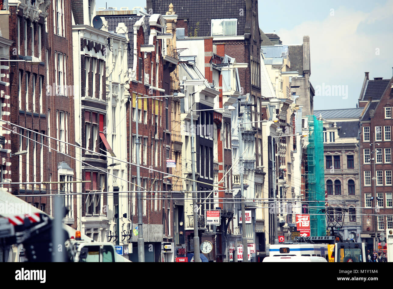 AMSTERDAM, THE NETHERLANDS - AUGUST 19, 2015: Rokin street with row of ...