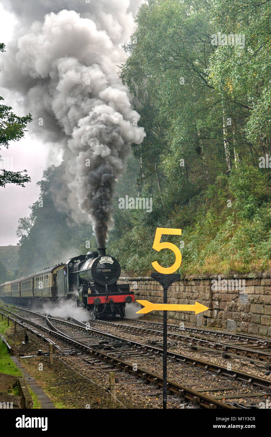 Steam train approaching Goathland station with an impressive smoke ...