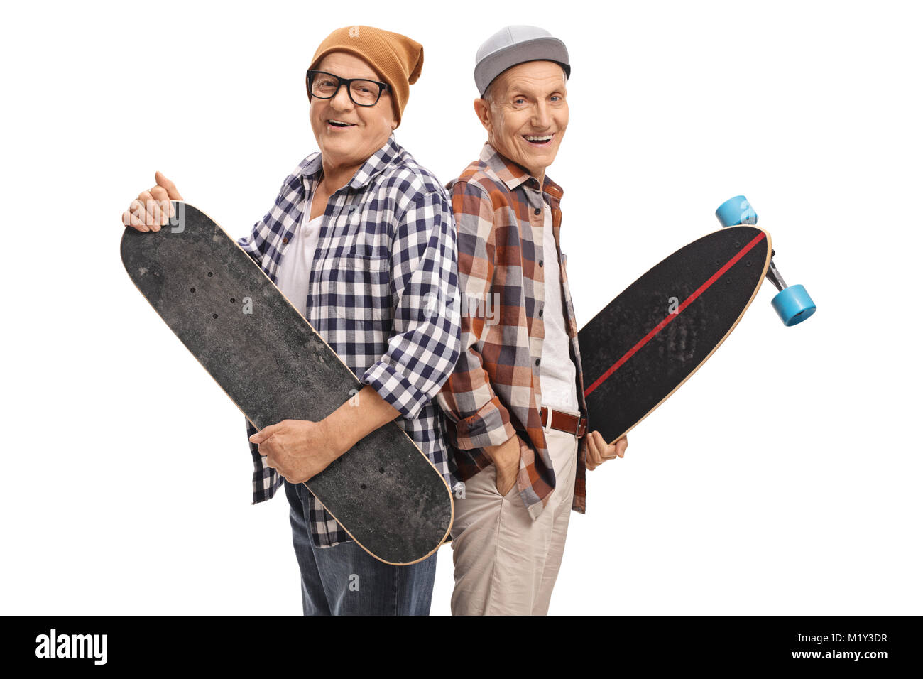 Elderly hipsters with a skateboard and a longboard looking at the ...