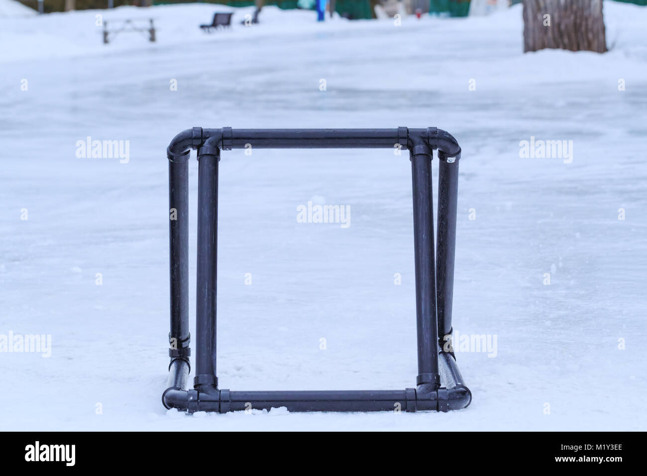 Ice skating support in a public ice rink. Winter landscape in ...