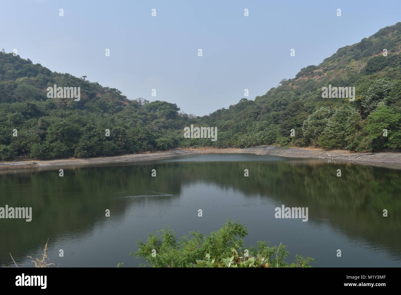 Awesome view of Lake between two mountain intersection Stock Photo - Alamy