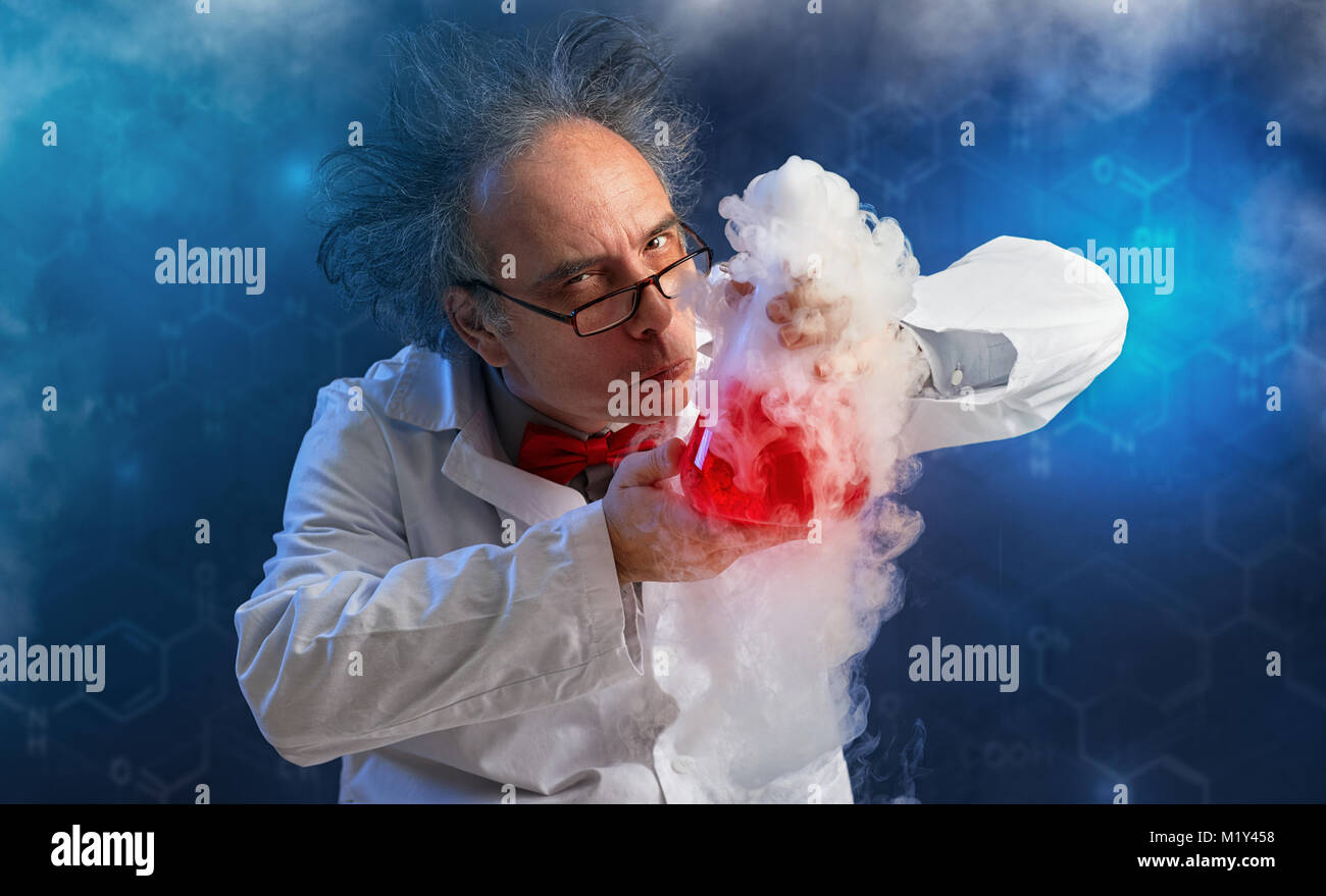 Wacky chemist with experiment sense of smell evaluates chemicals Stock ...