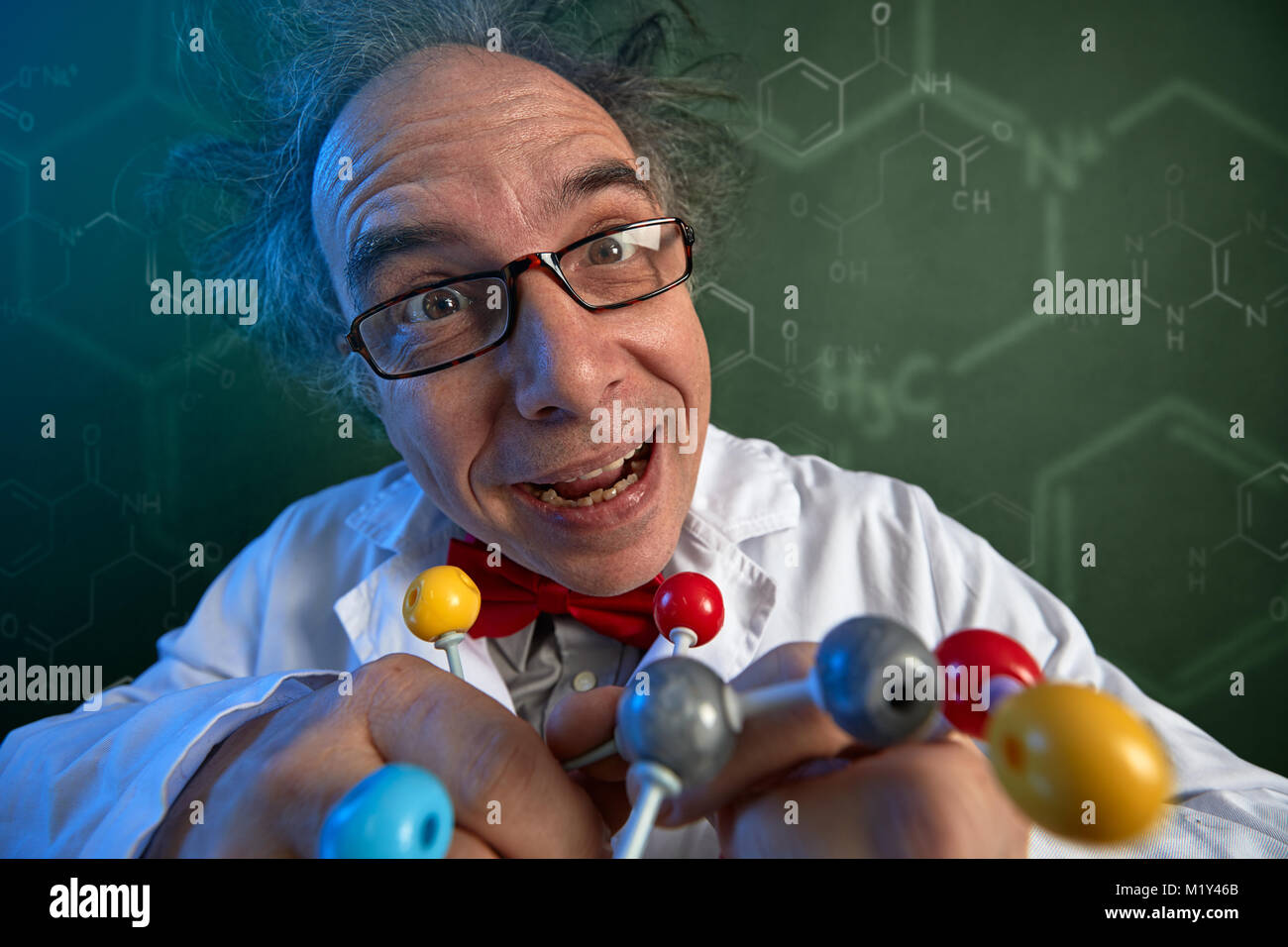 Scientist with wacky smile holding molecular structure model Stock ...