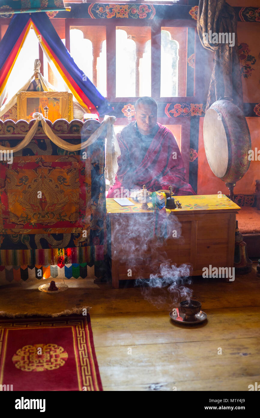 Paro, Bhutan. Buddhist Monk Reading Holy Scriptures in his Temple, the ...